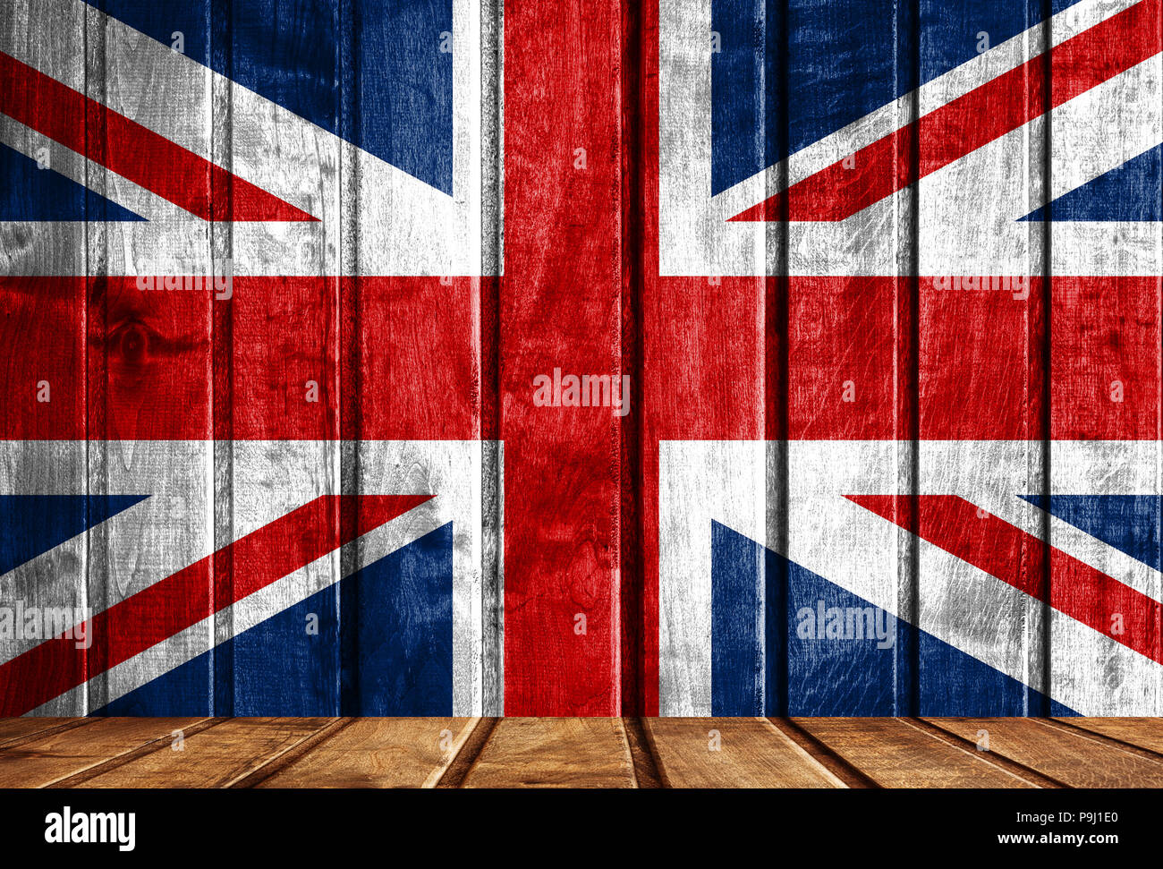 Wooden background with a flag of United Kingdom. There is a place for ...