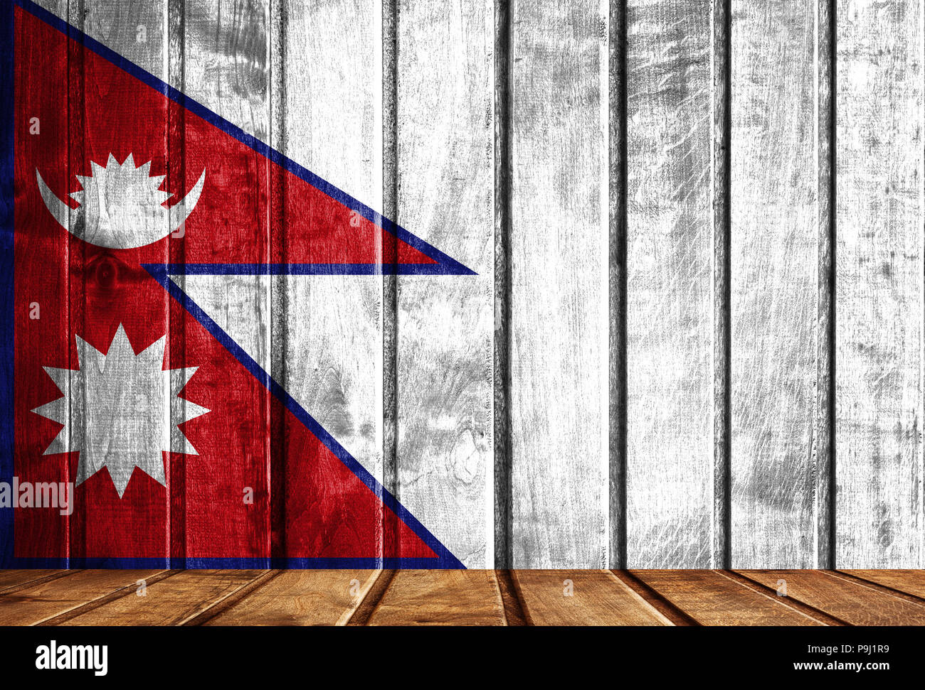 Wooden background with a flag of Nepal Stock Photo - Alamy