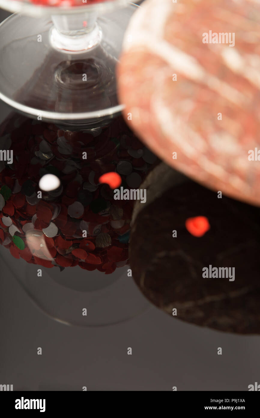 Natural stone and a glass on the varnished coating, the reflection of ...