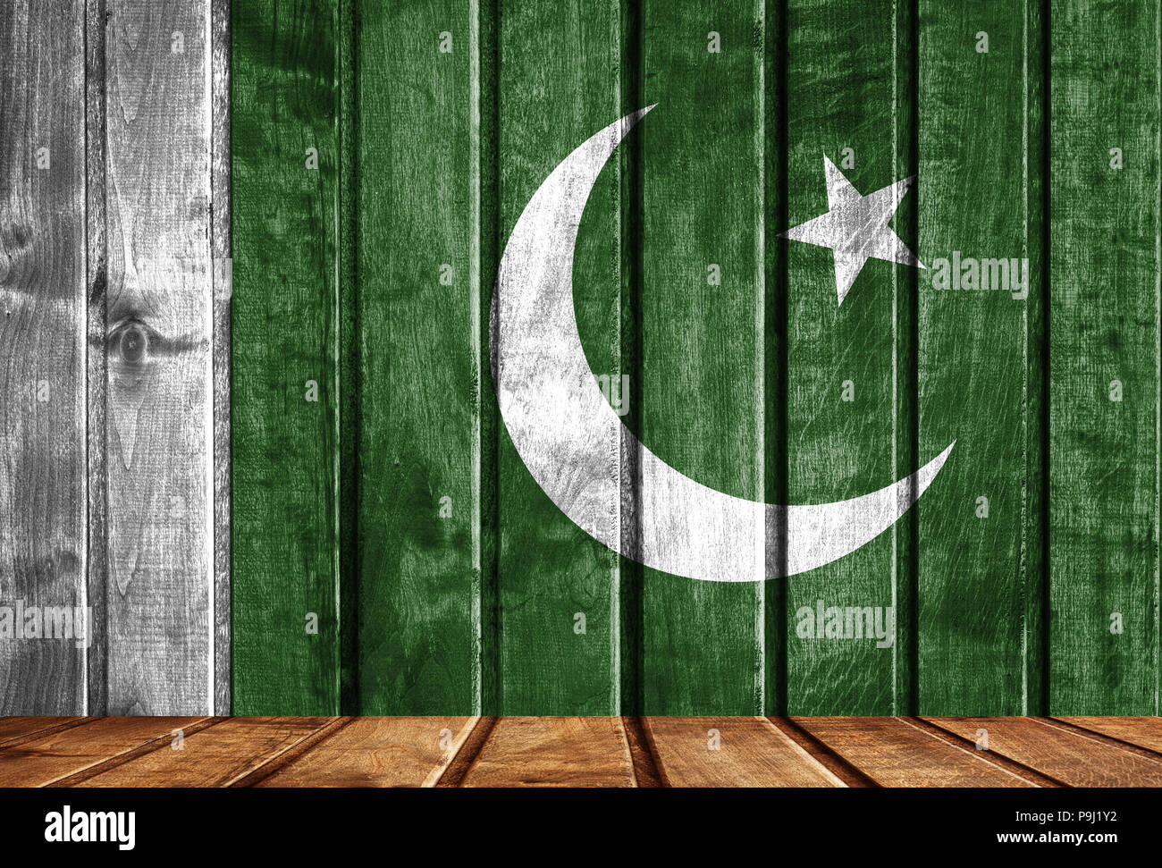 Wooden background with a flag of Pakistan Stock Photo - Alamy