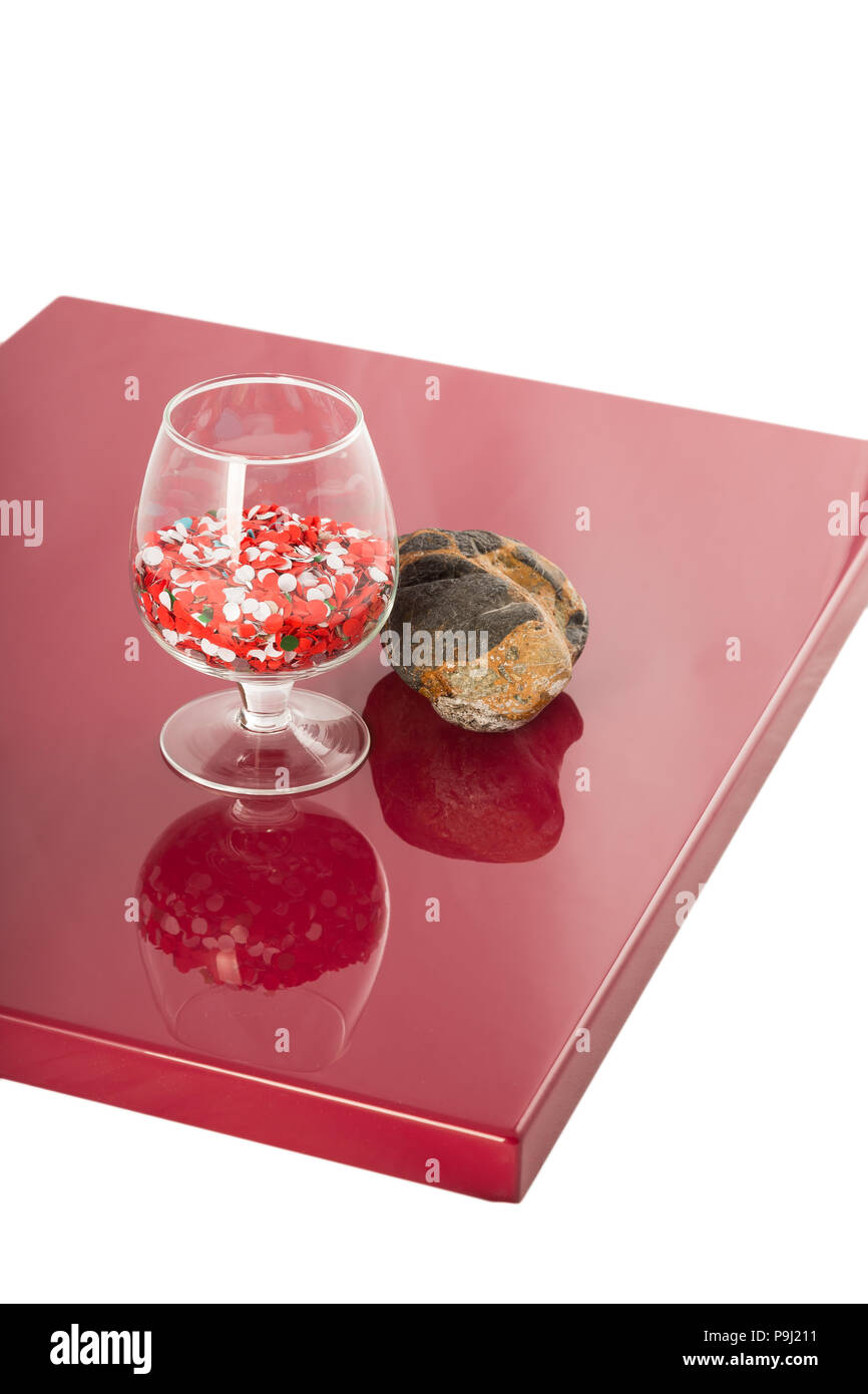 Natural stone and a glass on the varnished coating, the reflection of ...