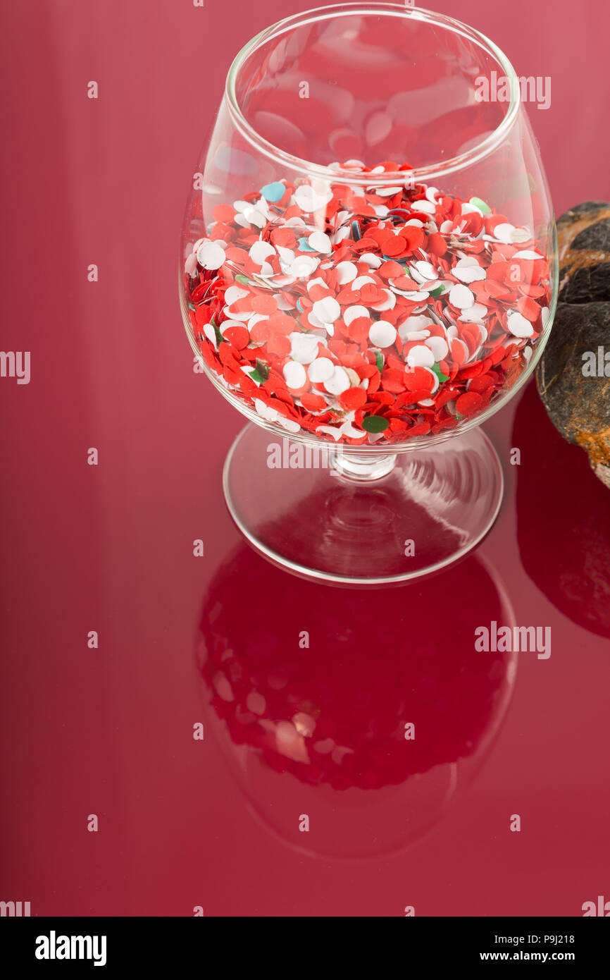 Natural stone and a glass on the varnished coating, the reflection of ...