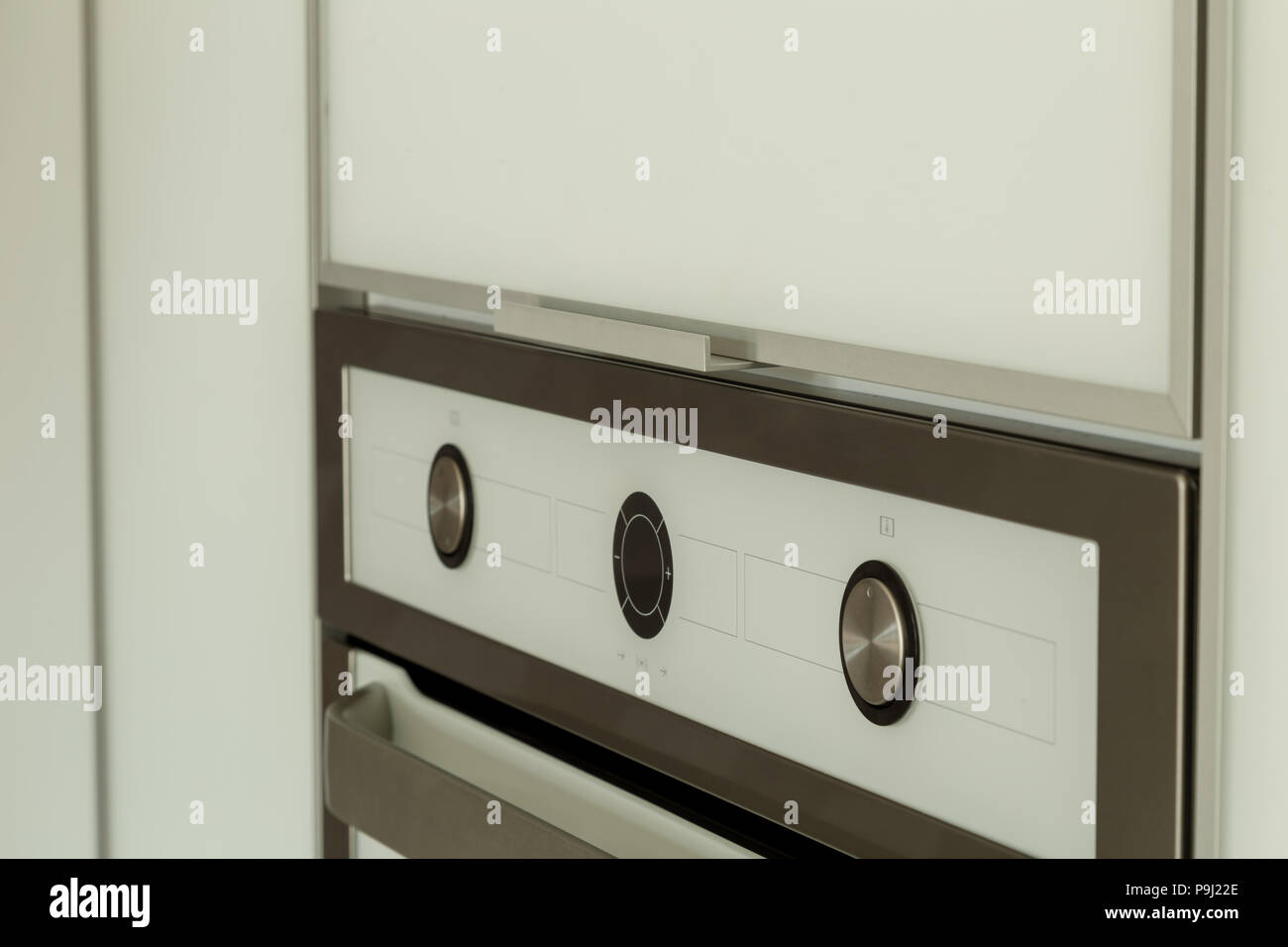 Oven panel close-up, regulators and placard for information Stock Photo ...