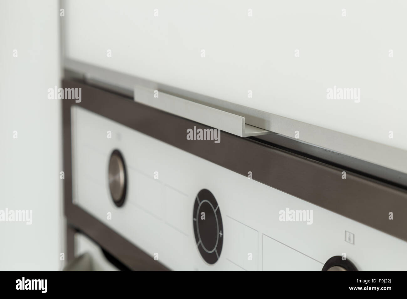Oven panel close-up, regulators and placard for information Stock Photo ...