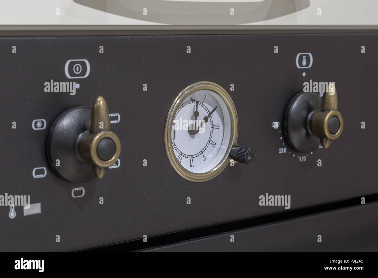 Oven panel close-up, regulators and placard for information Stock Photo ...