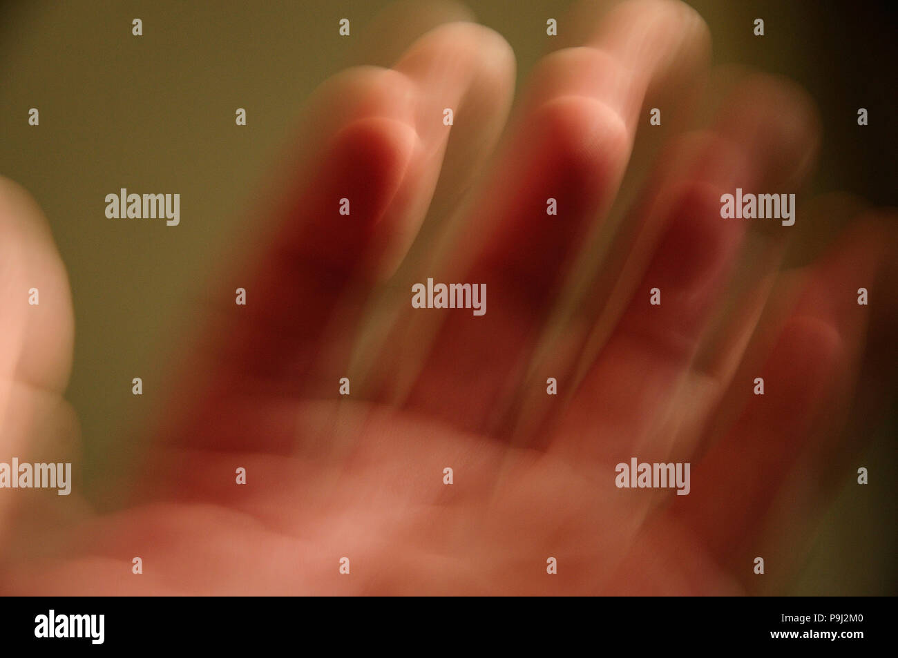Blurred hand hi-res stock photography and images - Alamy