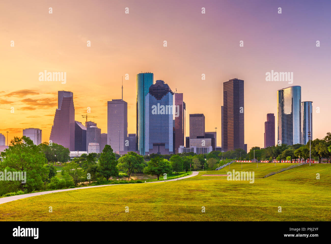 Houston, Texas, USA skyline and park at dusk Stock Photo - Alamy