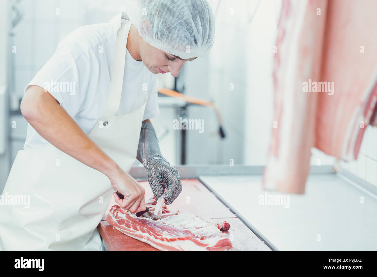 Meat cutting in butchery Stock Photo - Alamy