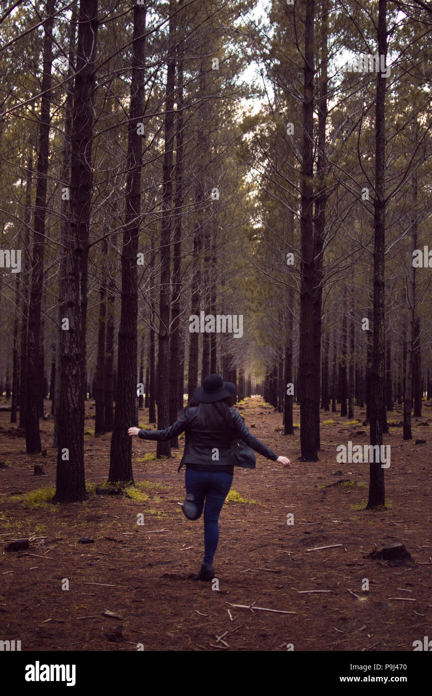 Girl Running In The Woods