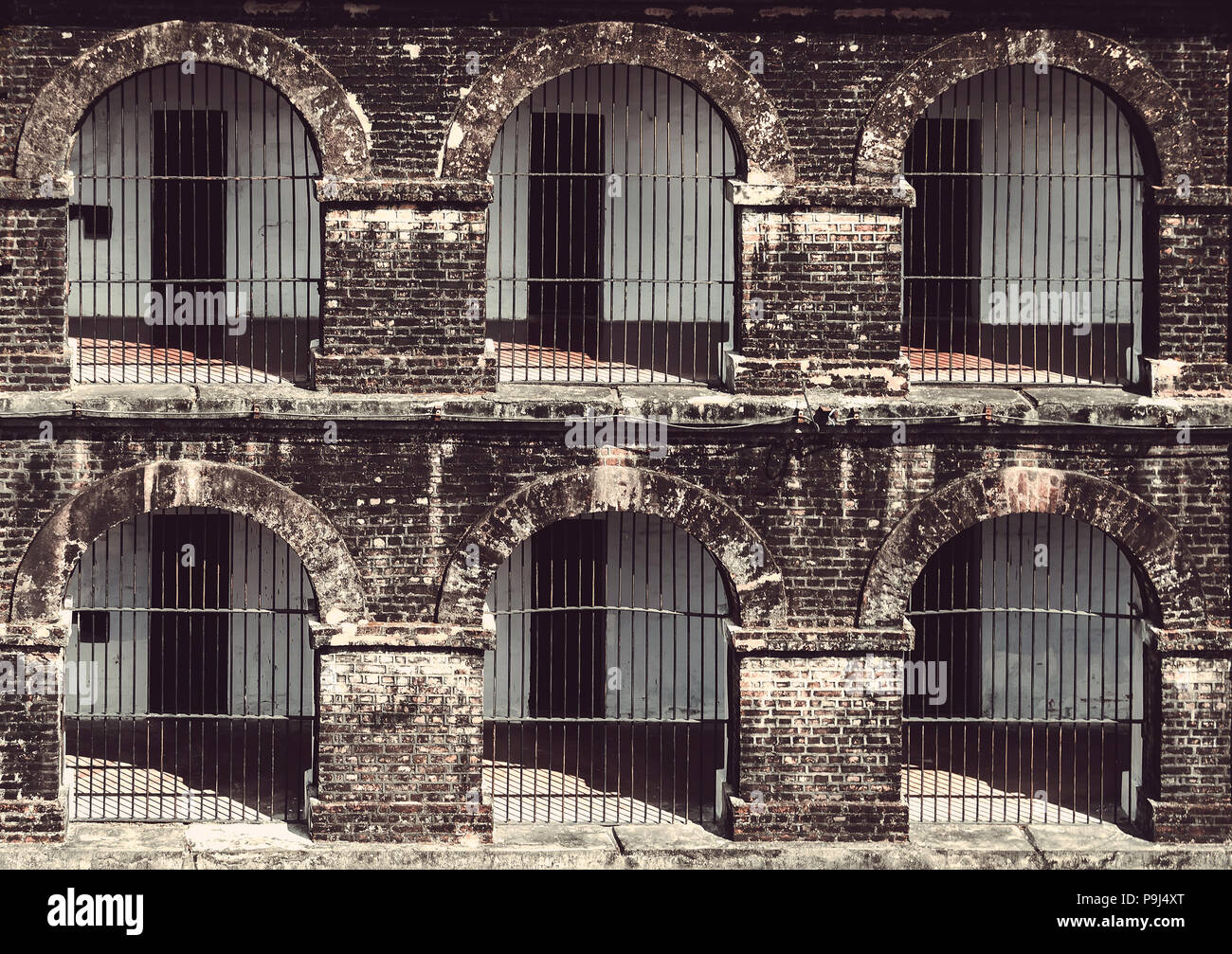 Old abandoned house with gratings on the windows used as police station ...