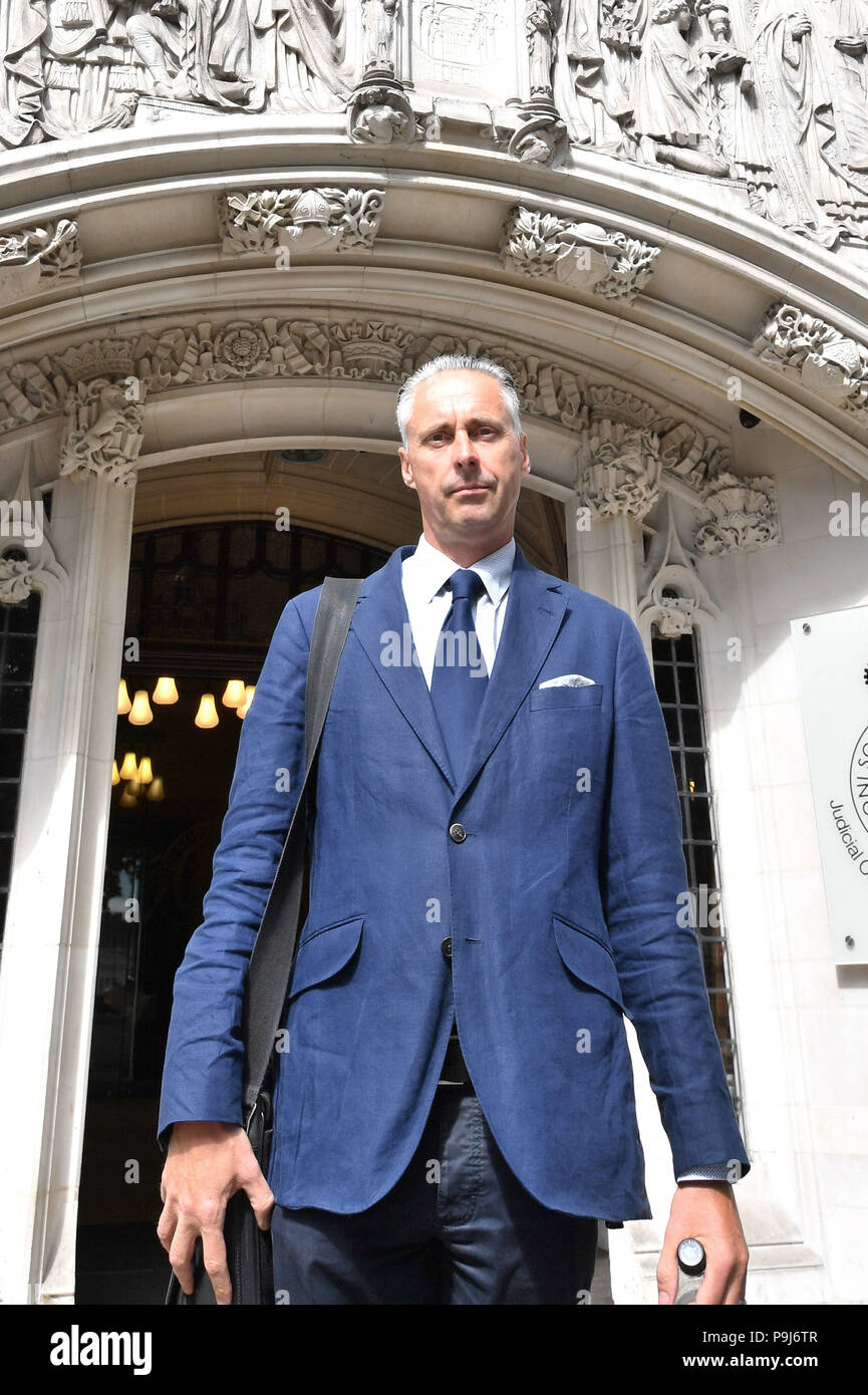 Graham Mills stands outside the Supreme Court after winning the dispute ...