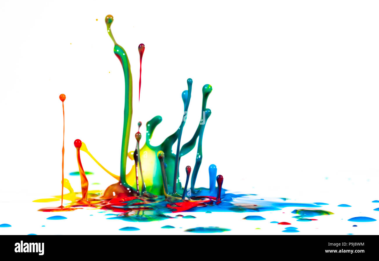 splash of color ink on white background Stock Photo - Alamy