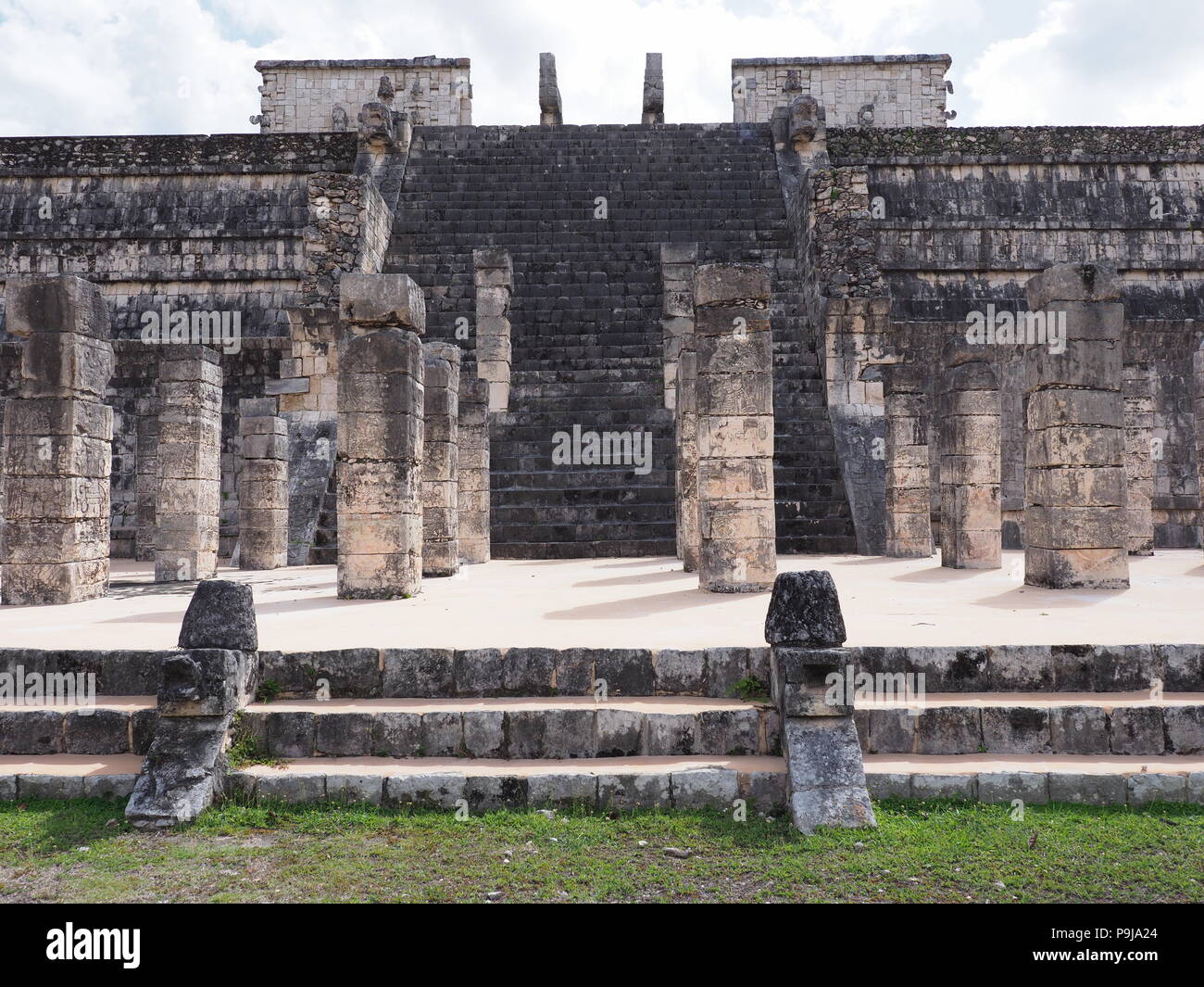 Front ruins of Temple of the Warriors building at Chichen Itza city in ...