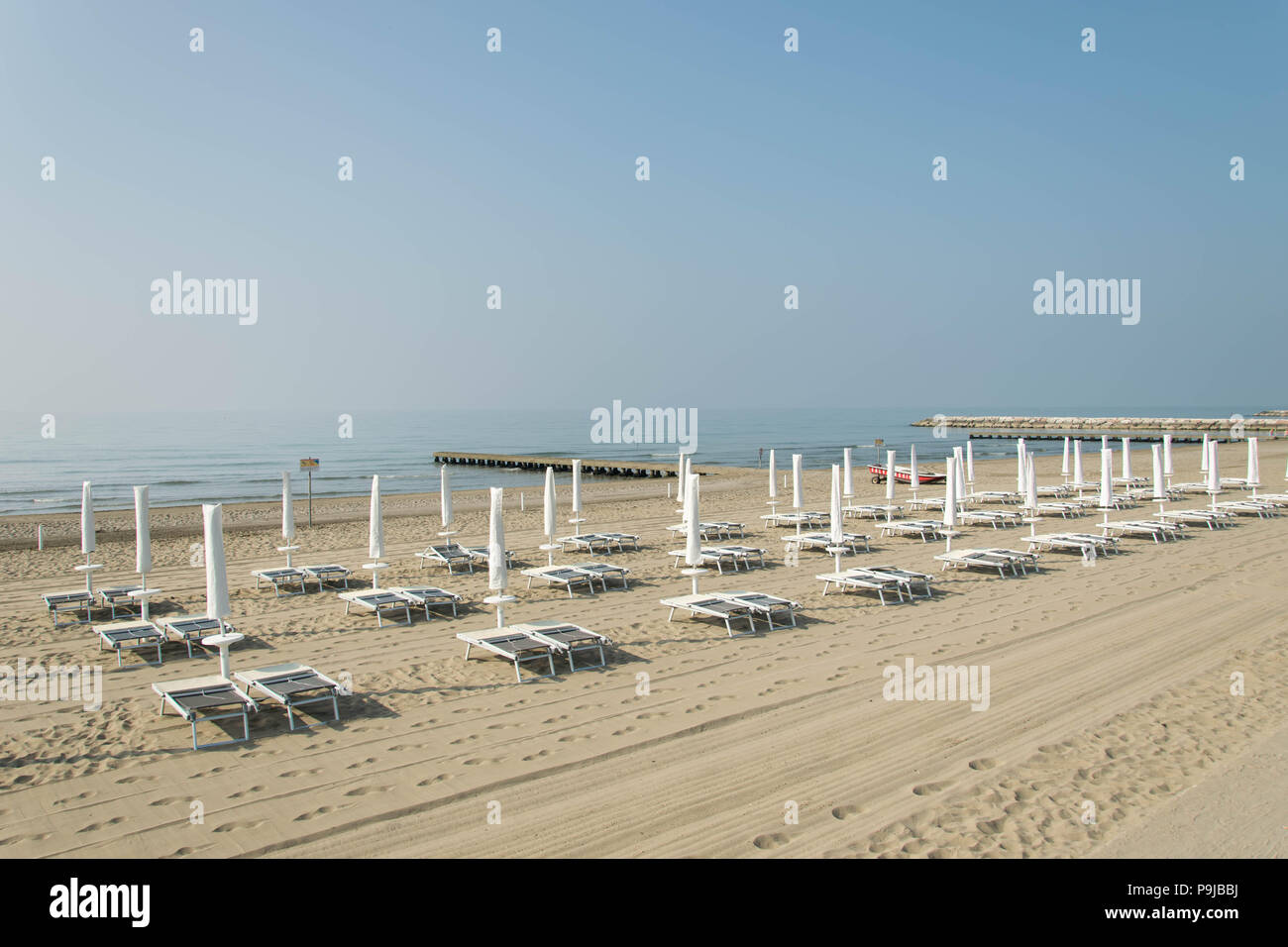 Europe, Italy, Veneto, Caorle. Beach prepared for tourist at Lido ...