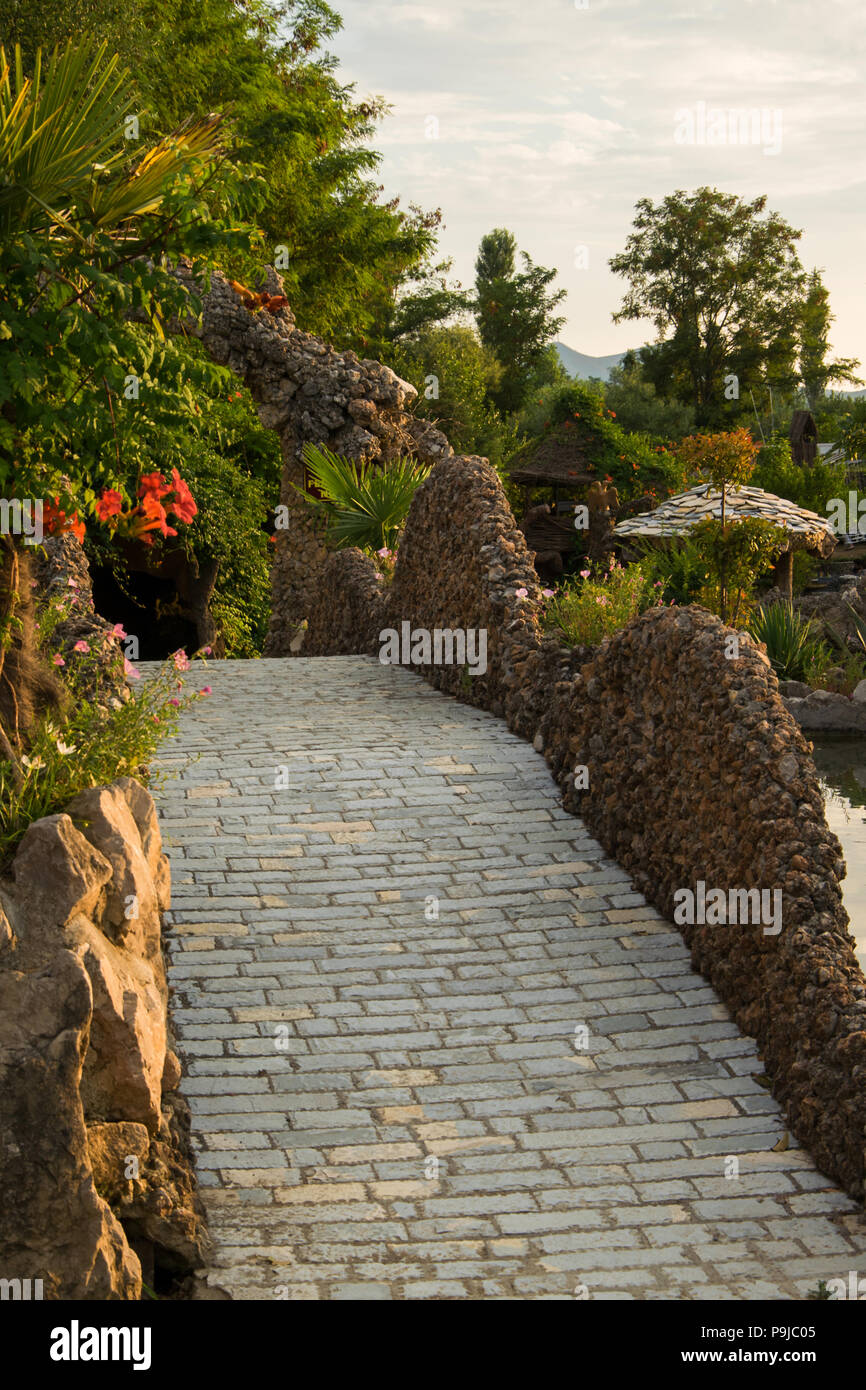 Garden exterior design - stone bridge for connect the different areas ...