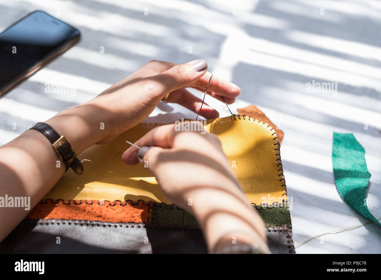 WORKSHOP, handmade leather accessories for hobby Stock Photo - Alamy