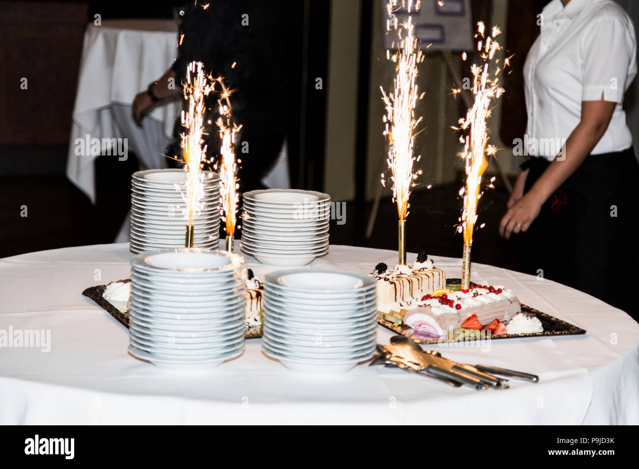 Wedding cake with fireworks Stock Photo - Alamy