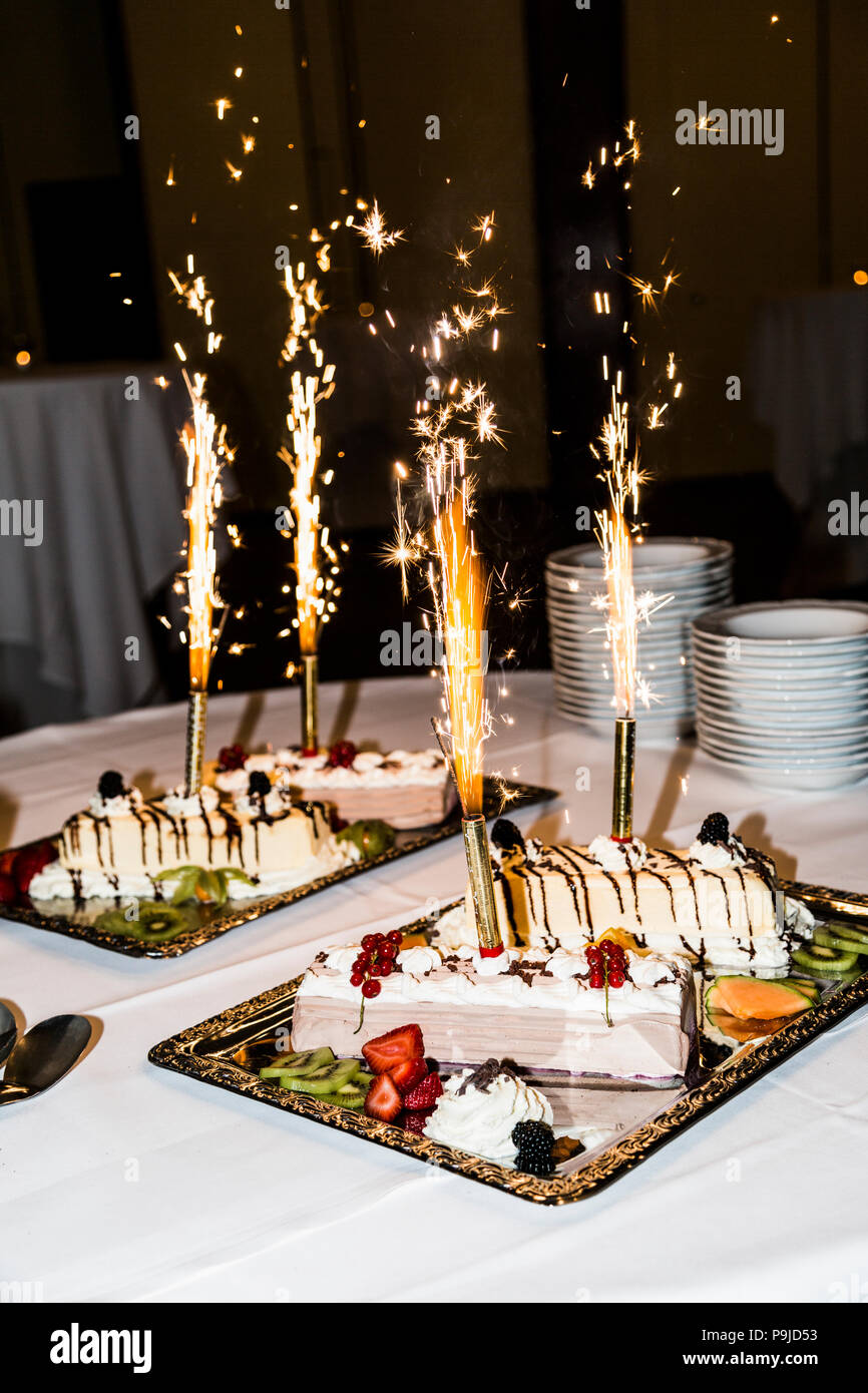 Wedding cake with fireworks Stock Photo - Alamy