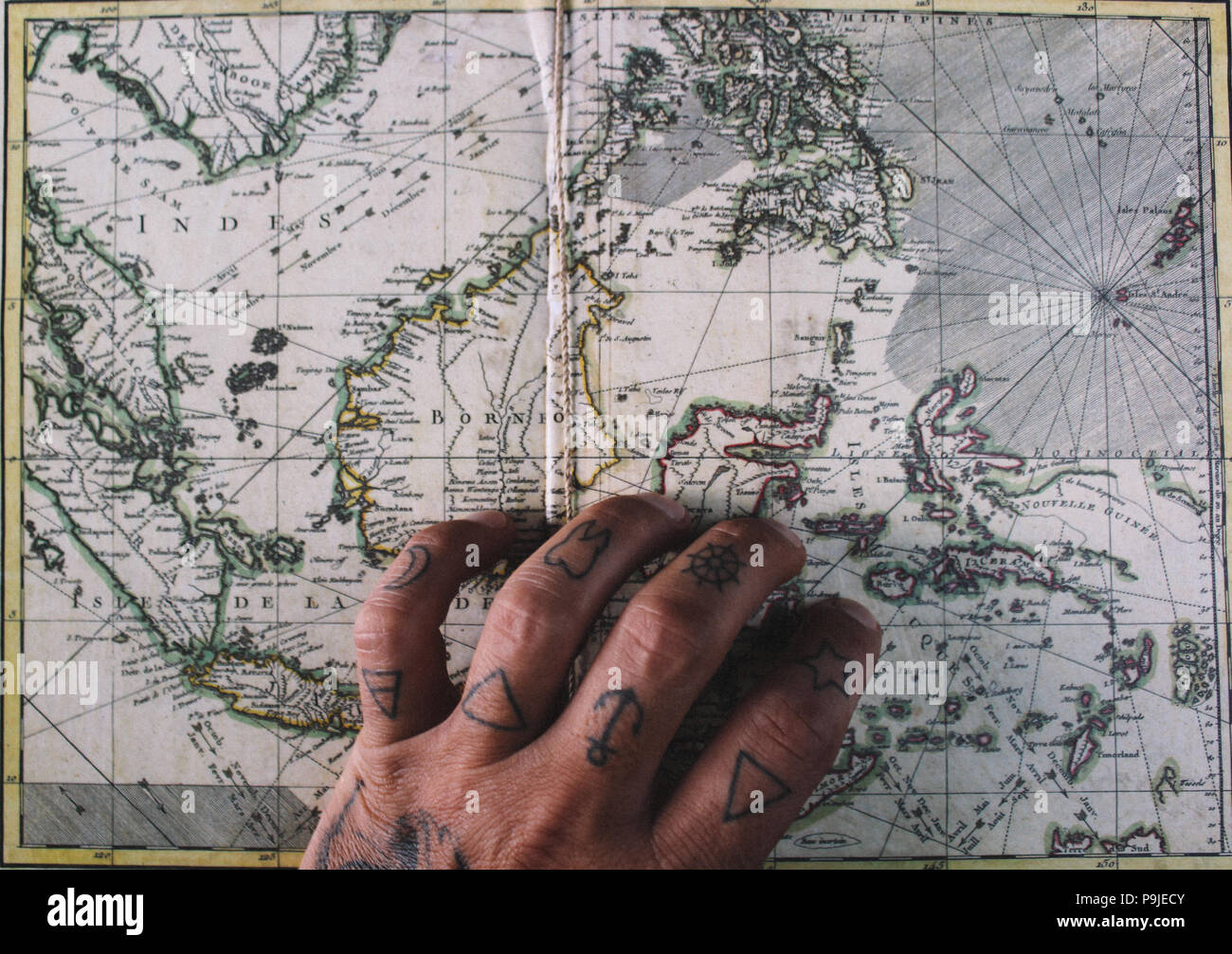 Man holding an old map Stock Photo - Alamy