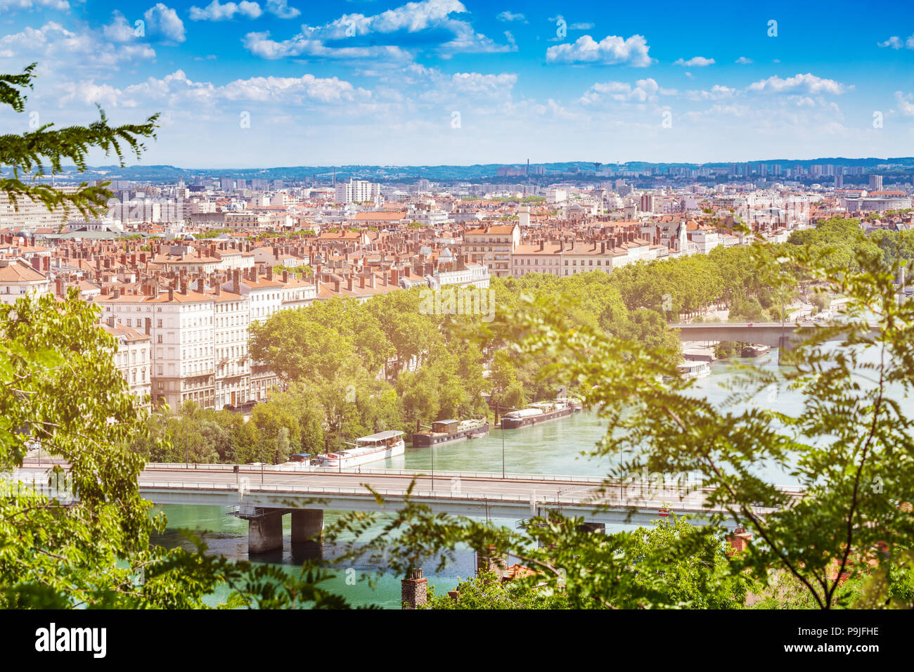 Panoramic view of Lyon with road bridges across the Rhone river at ...