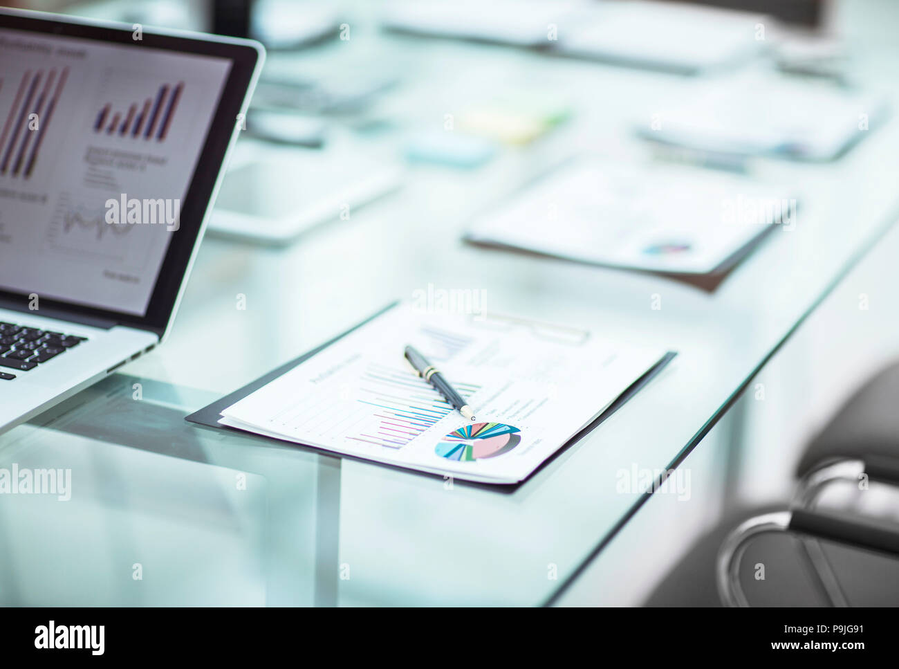 pen and financial documents on the table of the businessman Stock Photo ...