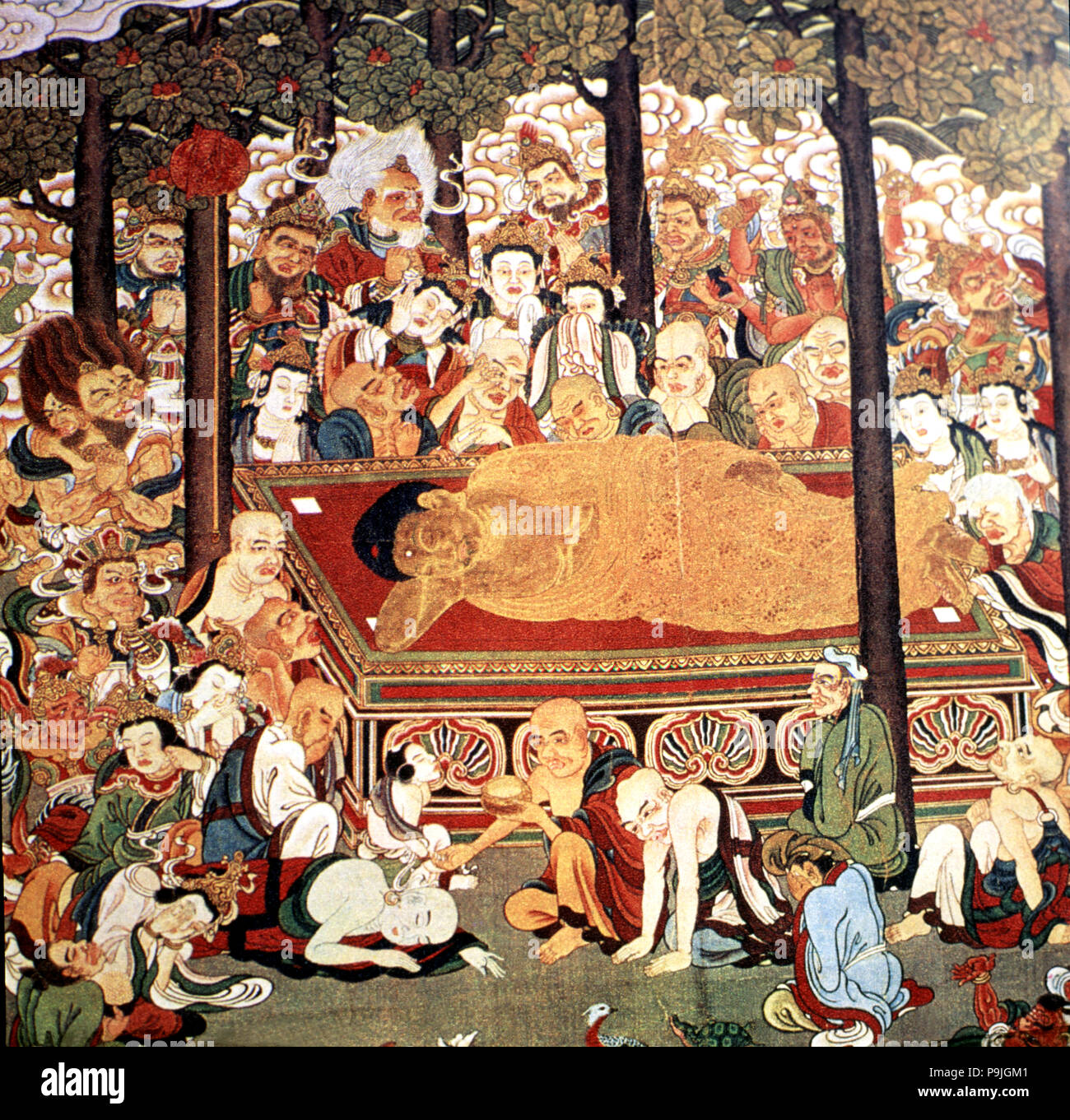 Buddha on his deathbed surrounded by his disciples and animals ...