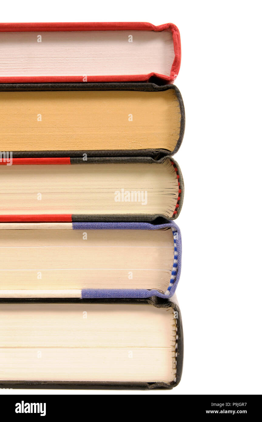 Small stack of hardback books isolated on white background Stock Photo ...