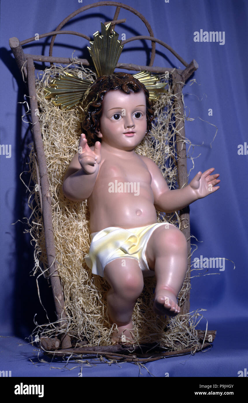 Figure of baby Jesus in the crib Stock Photo - Alamy