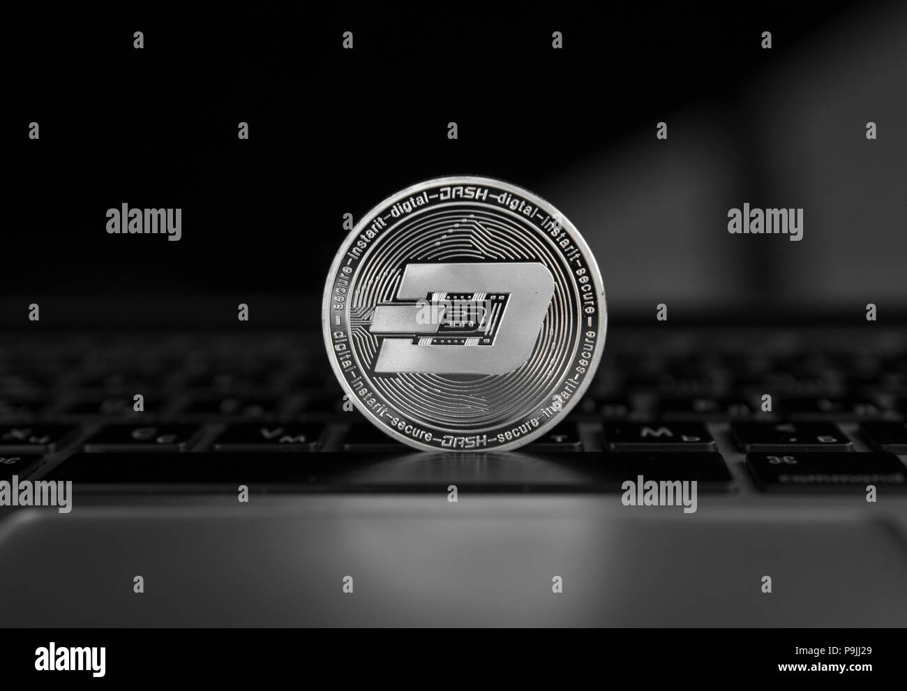 Dash coin symbol on laptop. Concept financial currency, crypto currency ...