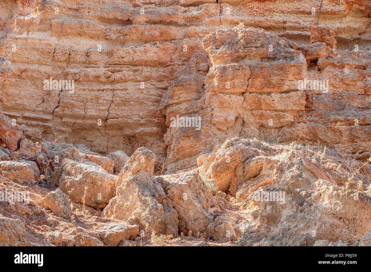 Yellow rocky mountain cliff natural texture wall background Stock Photo ...