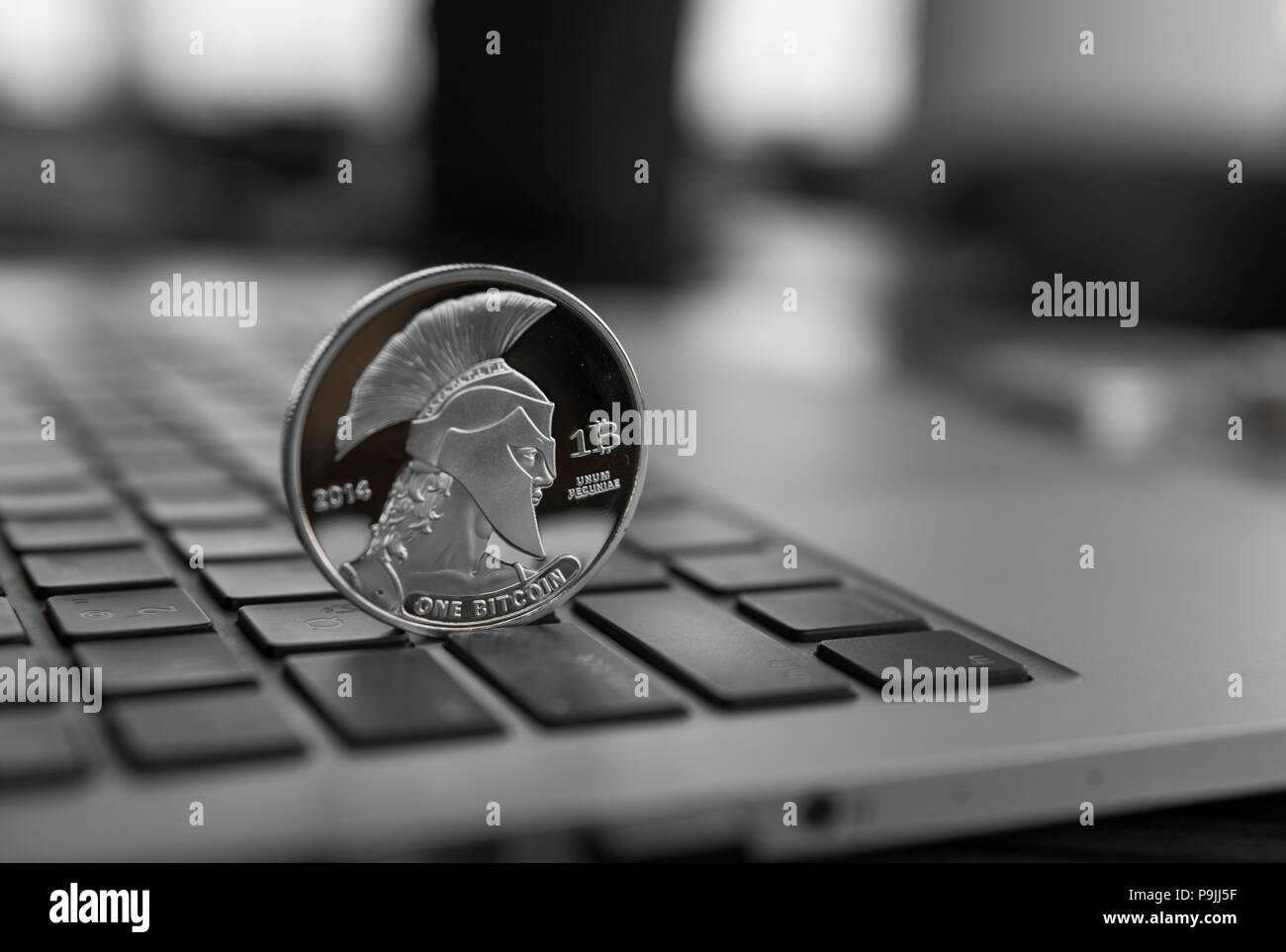 Titan bitcoin coin symbol on laptop. Concept financial currency, crypto ...