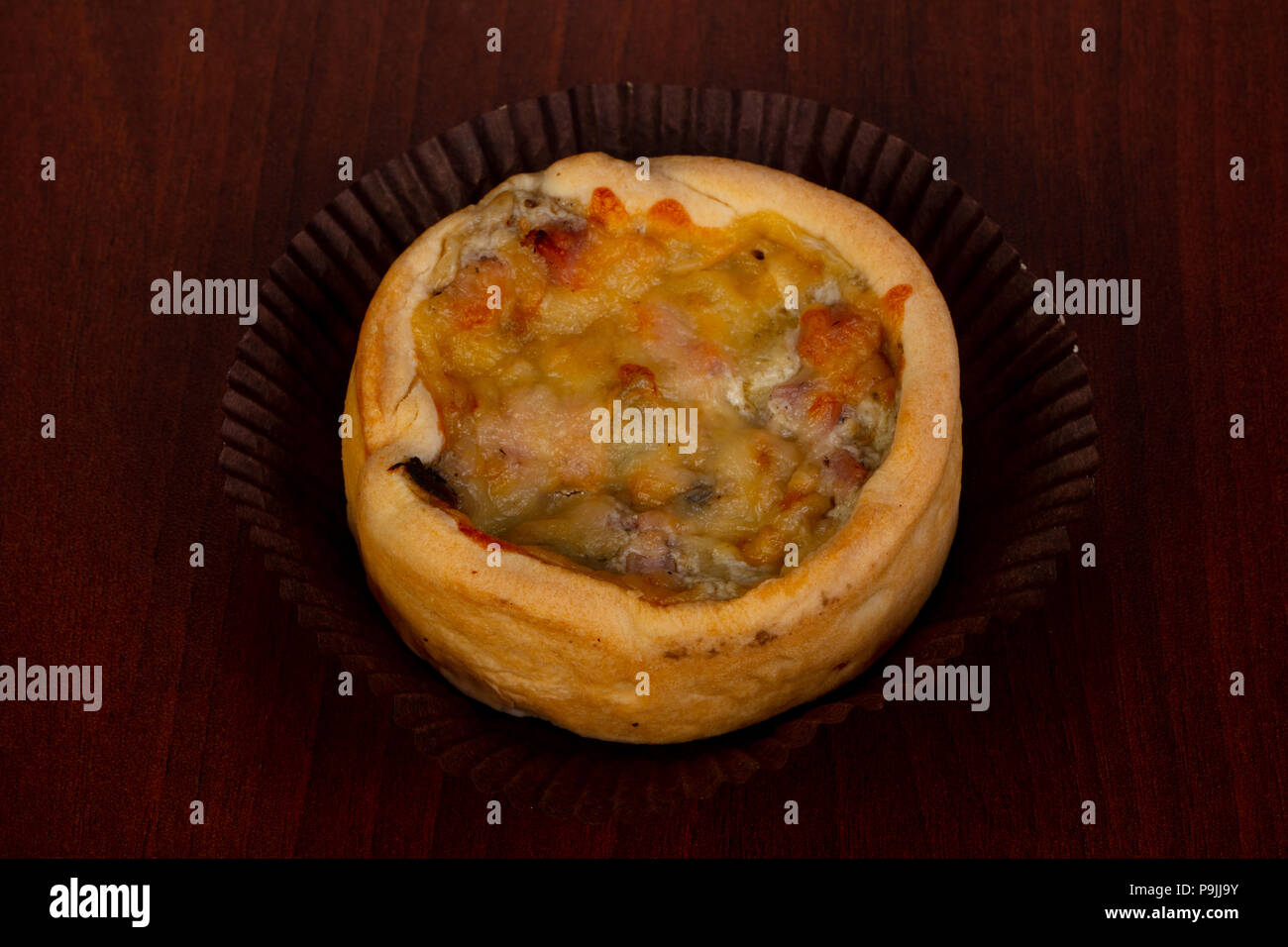 Tasty crust Kish with salmon Stock Photo - Alamy