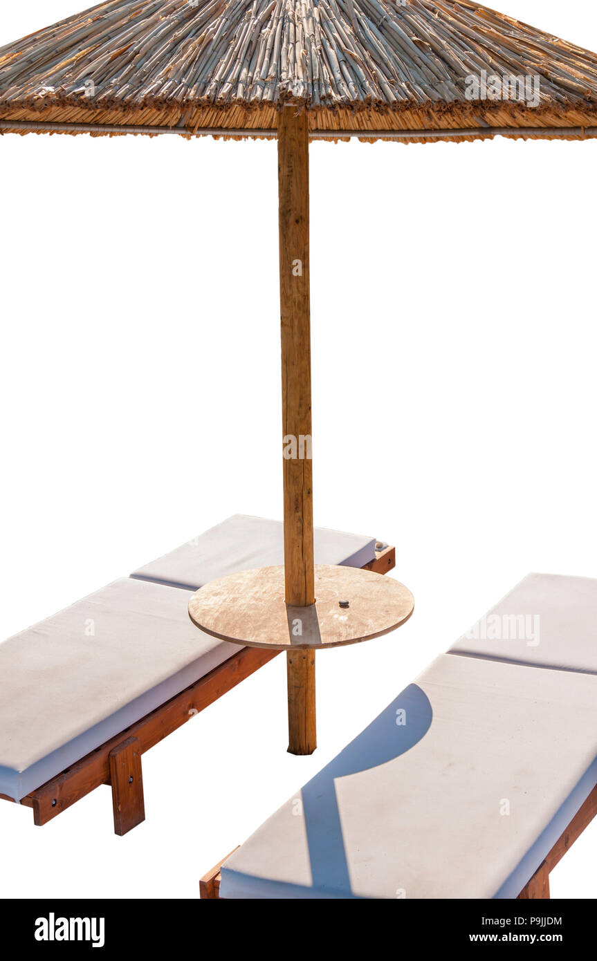Two empty sun bed isolated on white background Stock Photo - Alamy