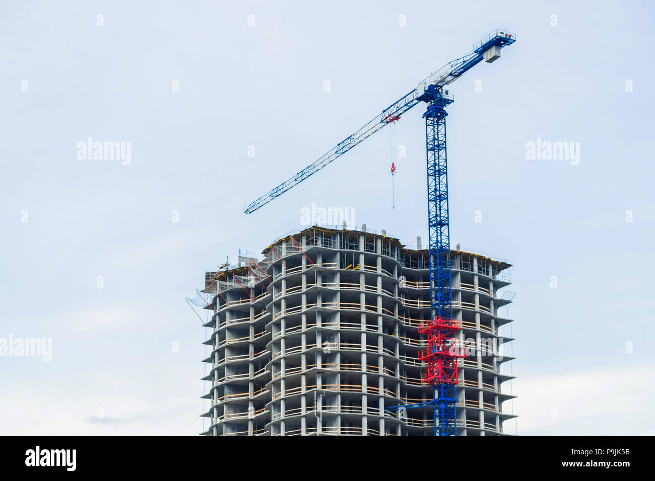 Machinery crane working in construction site building industry Stock ...