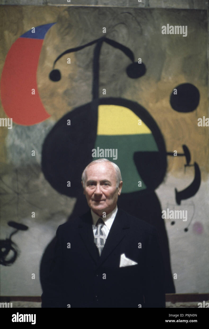 Joan Miró (1893-1983), Spanish Painter, pictured with one of his works ...