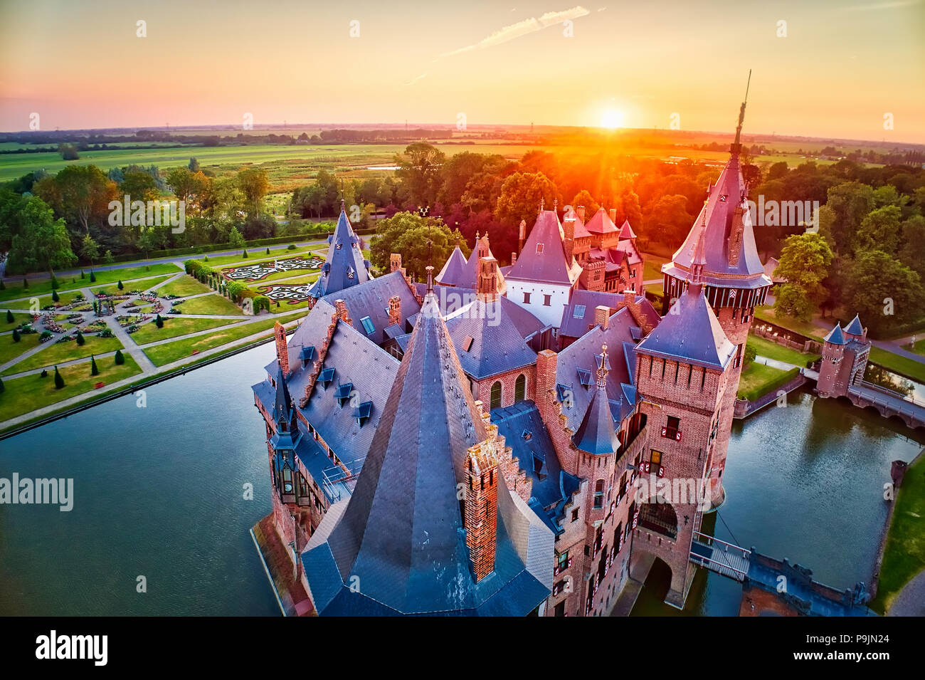Aerial view of the medieval castle De Haar at sunset in Netherlands ...