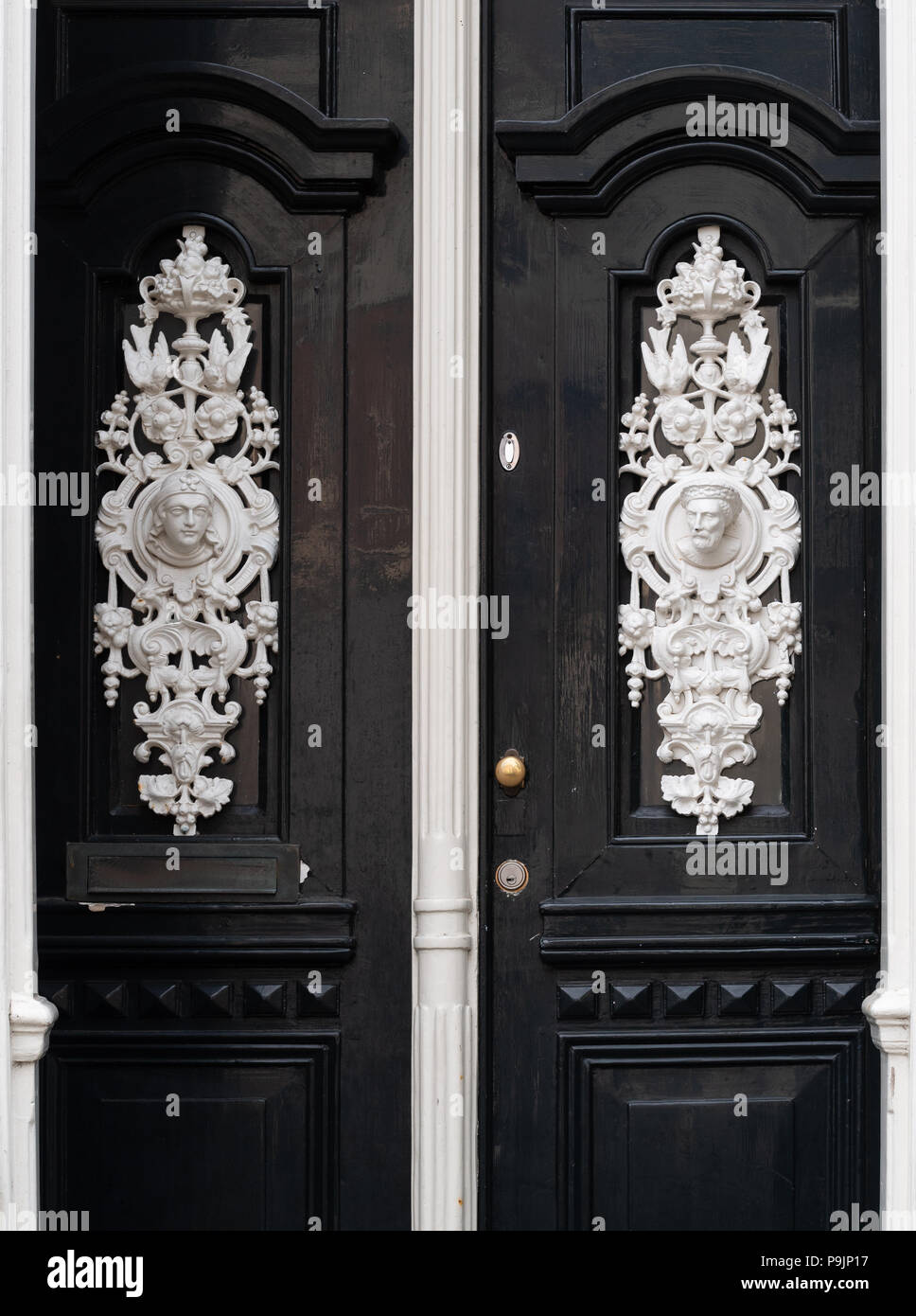 Ornate door decorations in Amsterdam, Netherlands Stock Photo - Alamy