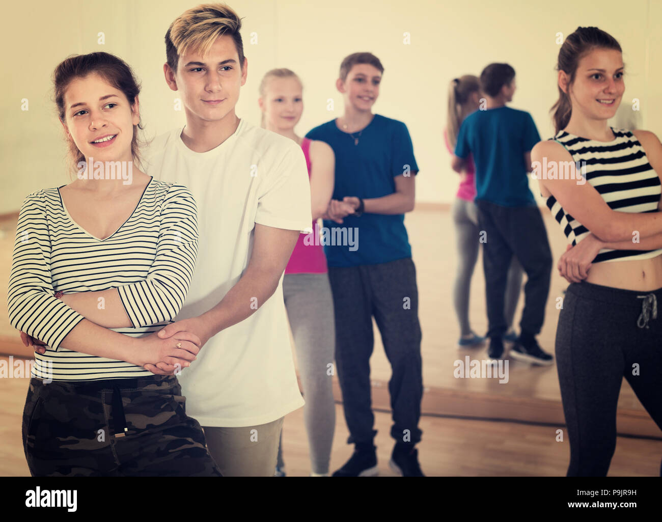Positive teenagers having dancing class in ballet studio Stock Photo ...