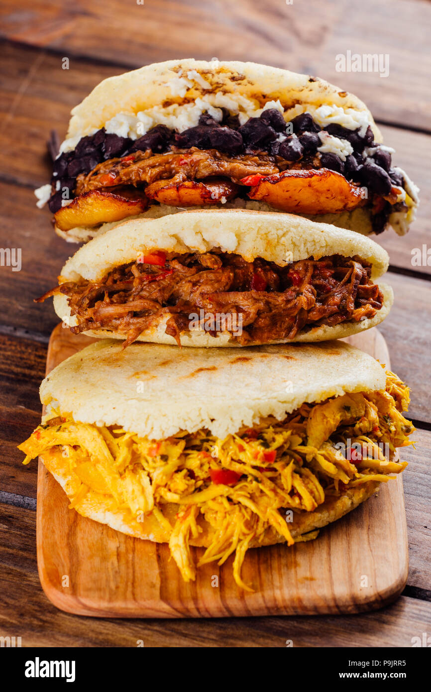 Venezuelan traditional Arepas freshly made, with 3 different fillings ...