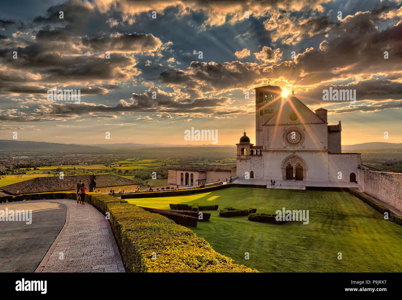 Cathedral of Assisi during sunset Stock Photo - Alamy