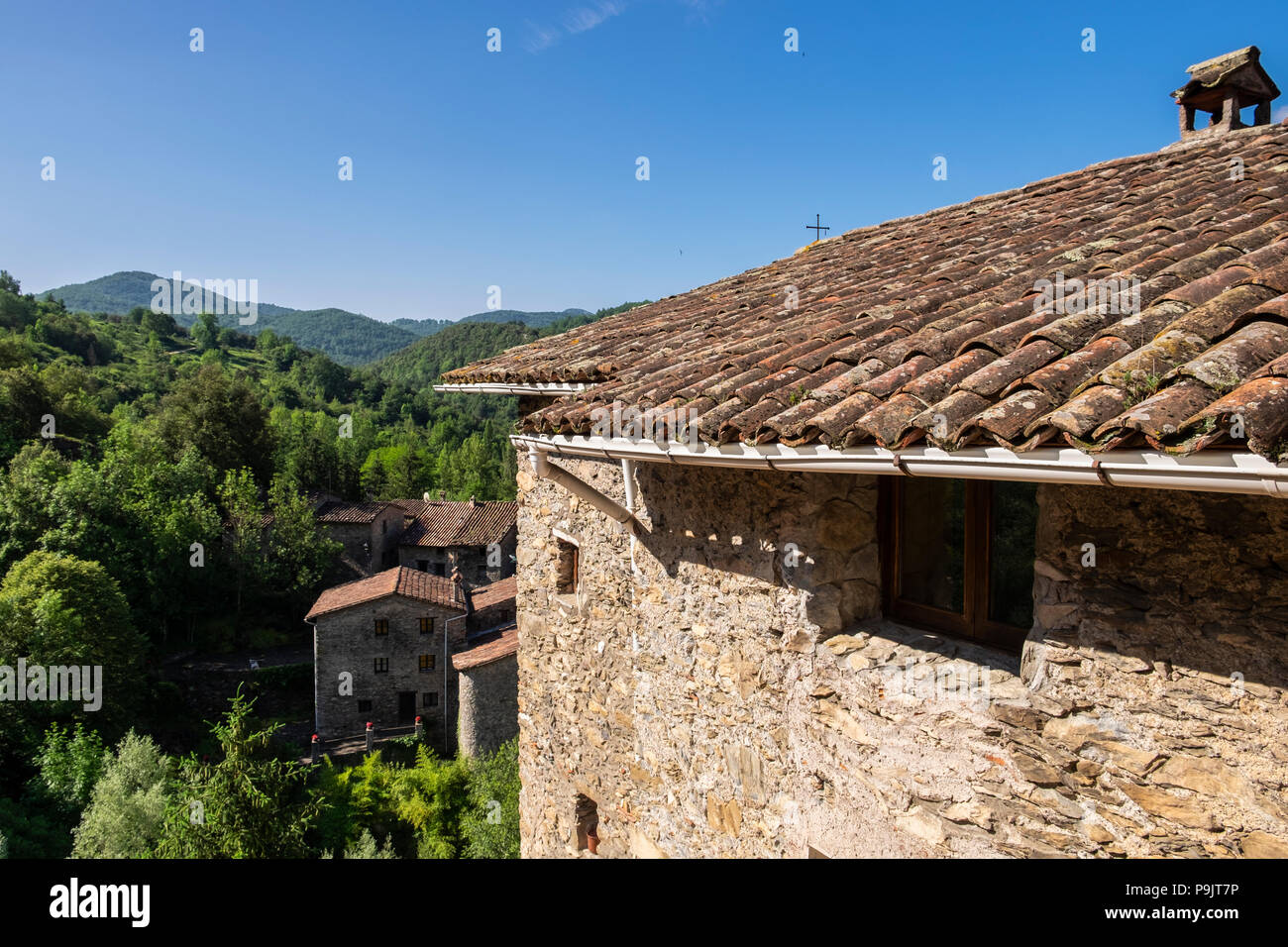 Typical traditional architecture in a golden ochre granite stone in the ...