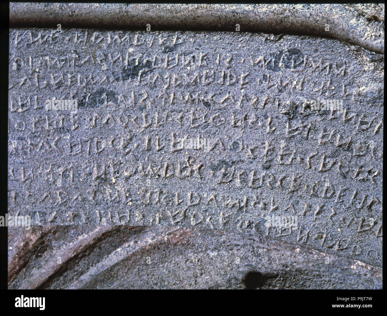 Etruscan writing in a stone sarcophagus with reliefs of Eastern ...