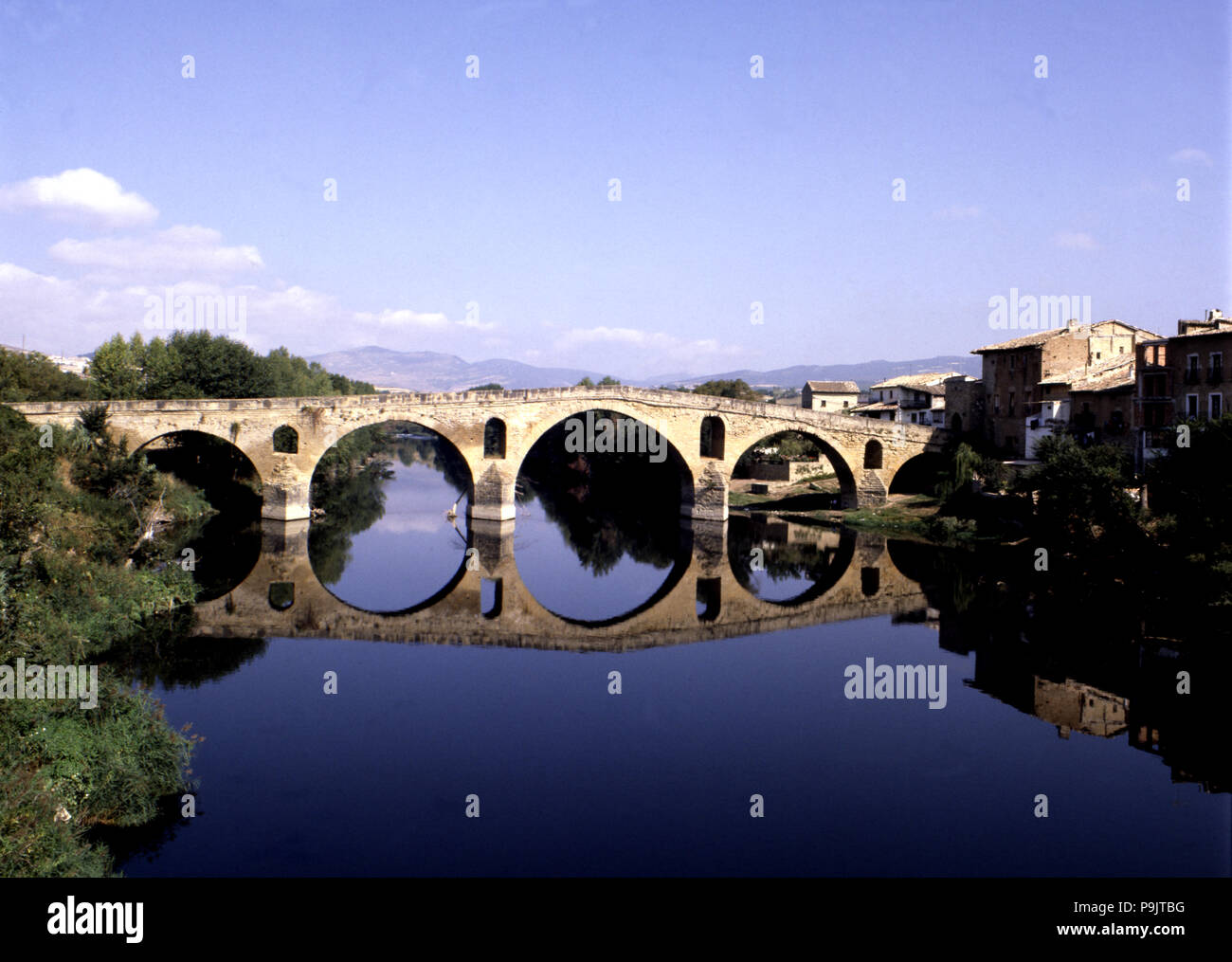 View of the Romanesque bridge over Arga river in Puente de la Reina ...