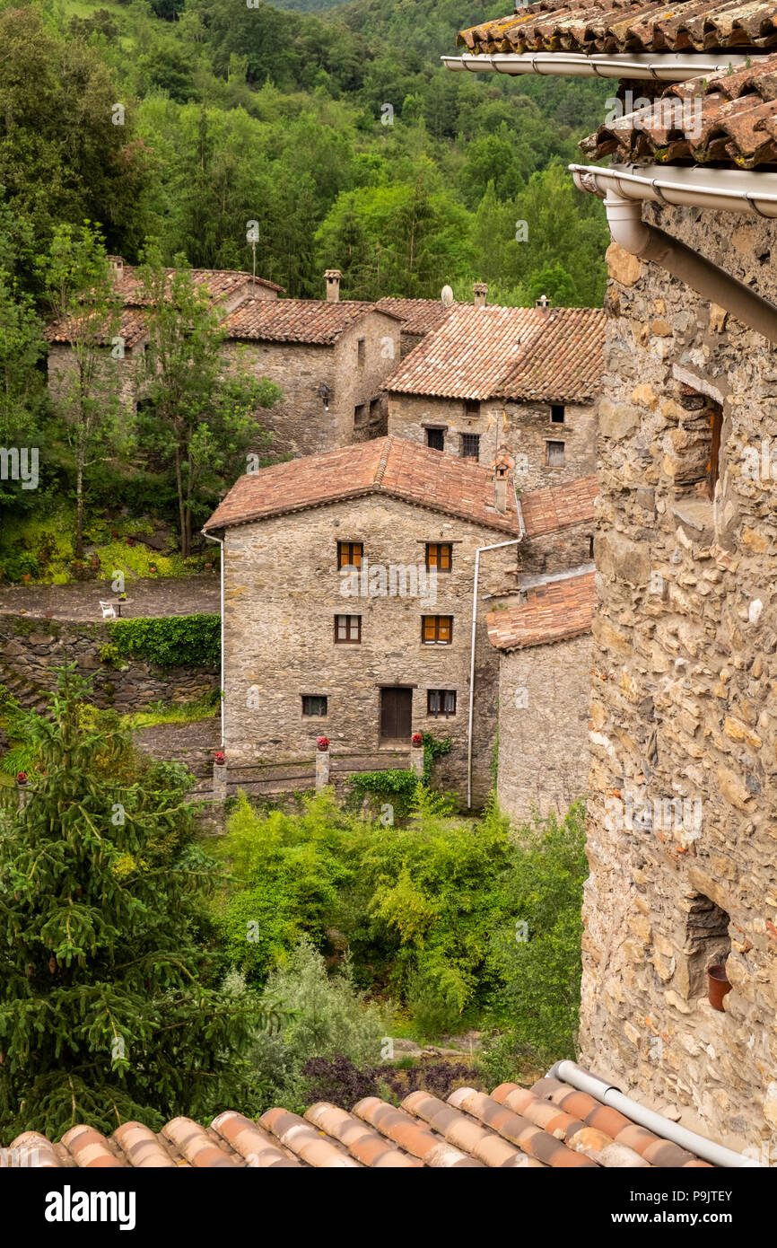 Typical traditional architecture in a golden ochre granite stone in the ...