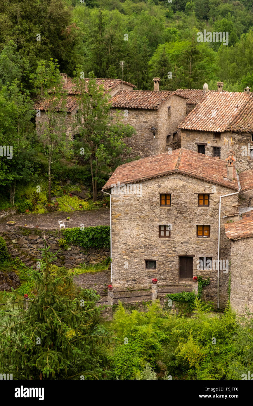 Typical traditional architecture in a golden ochre granite stone in the ...
