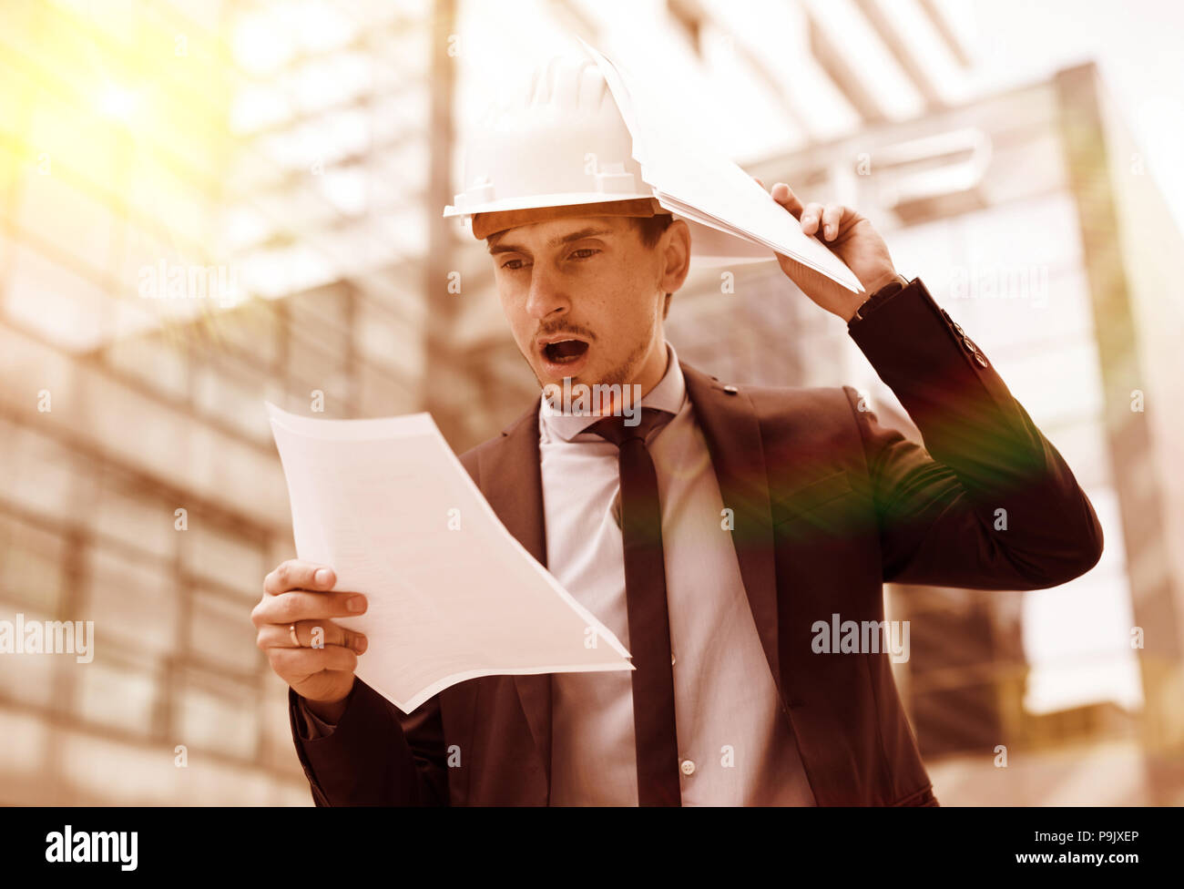 Portrait of man working outdoors and having hard work Stock Photo - Alamy