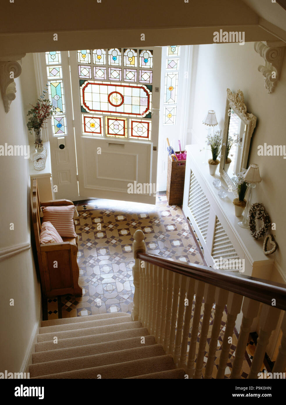 Looking down stairs at original tessellated tiled floor in townhouse ...