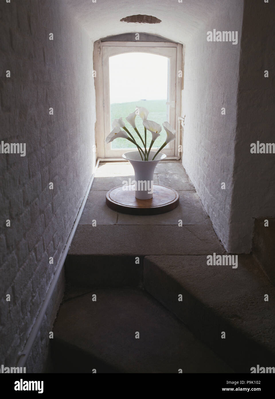 Recessed landing window in converted Martello tower Stock Photo - Alamy