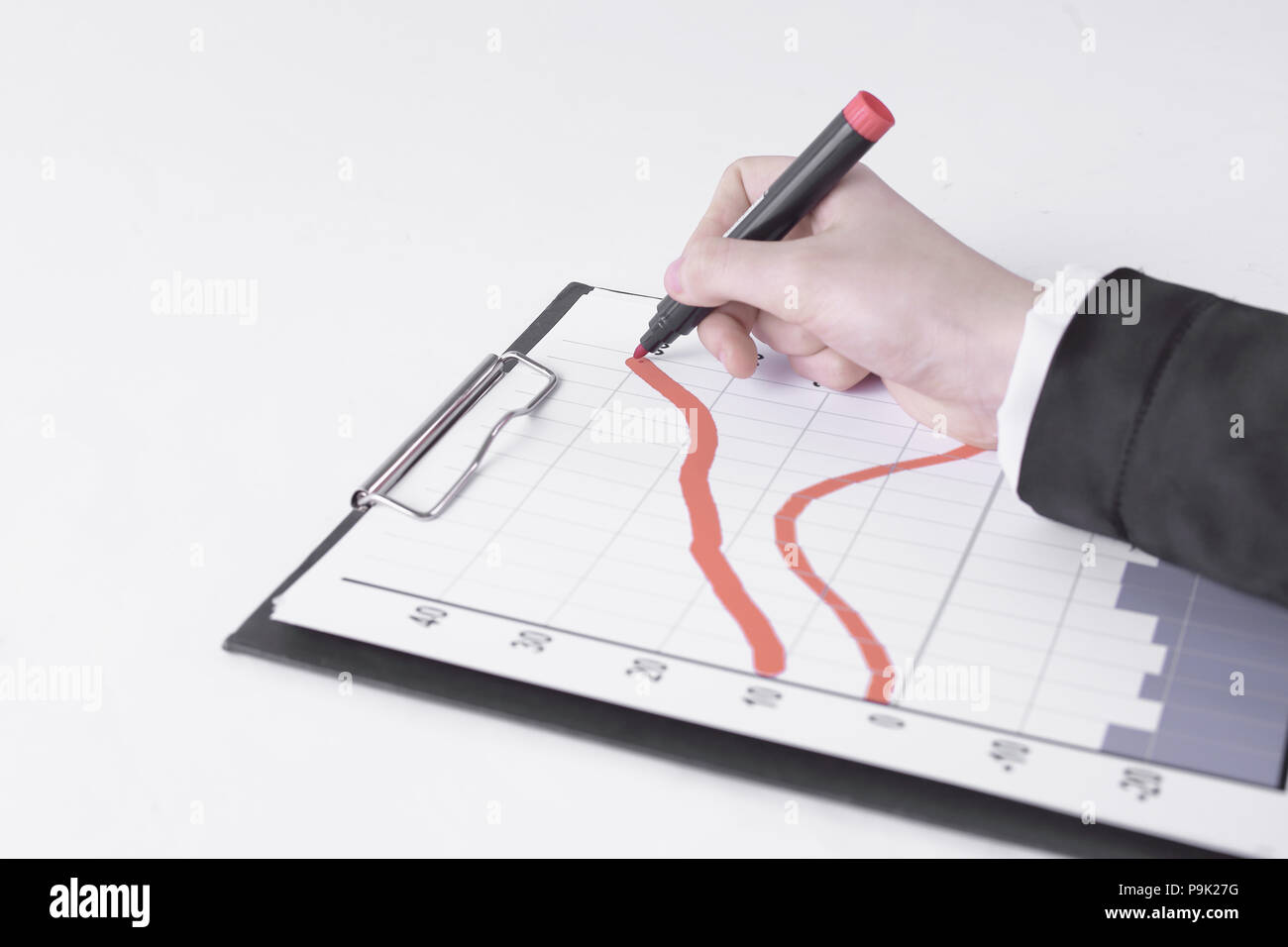 closeup .Businessman drawing a stock chart.isolated on white Stock ...