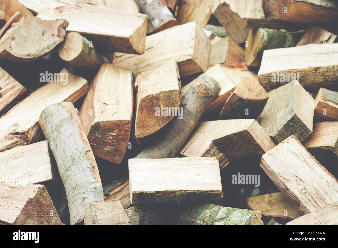 chopped firewood stack close up natural materials background Stock ...